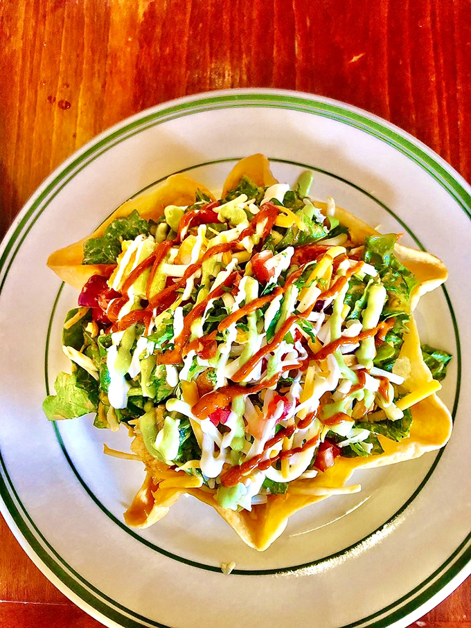 Taco salads often disappoint, but this crispy shell cradles fresh ingredients with the structural integrity of the Brooklyn Bridge and twice the flavor.