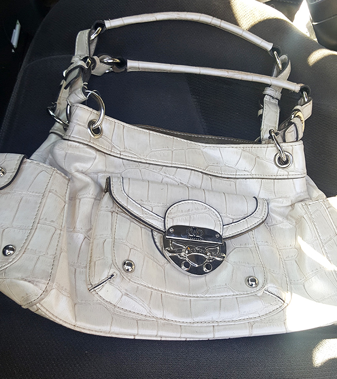 That's not just any white handbag&mdash;that's the designer accessory someone paid hundreds for that could be yours for pocket change.