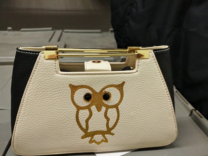 Who gives a hoot about retail prices? This owl-adorned handbag combines whimsy and practicality &ndash; the perfect thrift store score.