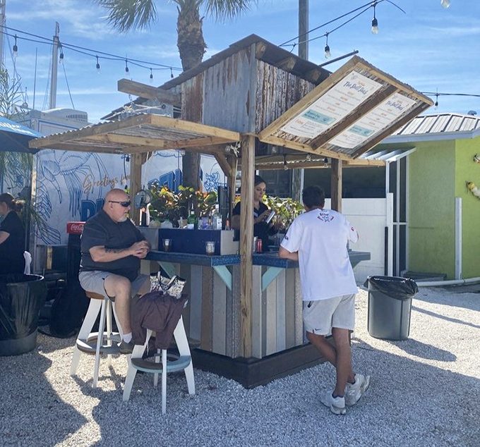 A tiki bar that understands its assignment: cold drinks, casual vibes, and zero pretension. Paradise doesn't need marble countertops.