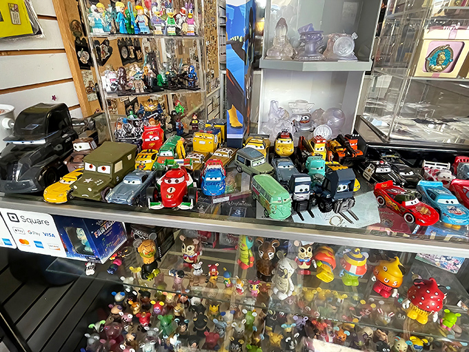 Toy cars and collectible figures stand at attention behind glass, ready to race straight into the hearts of collectors young and old.