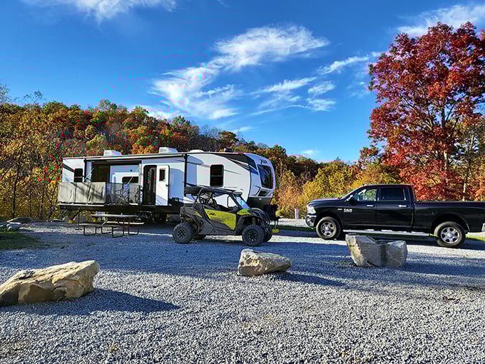 Fall colors frame this campsite at nearby Trailhead ATV Resort, where nature's splendor comes without a premium price tag.