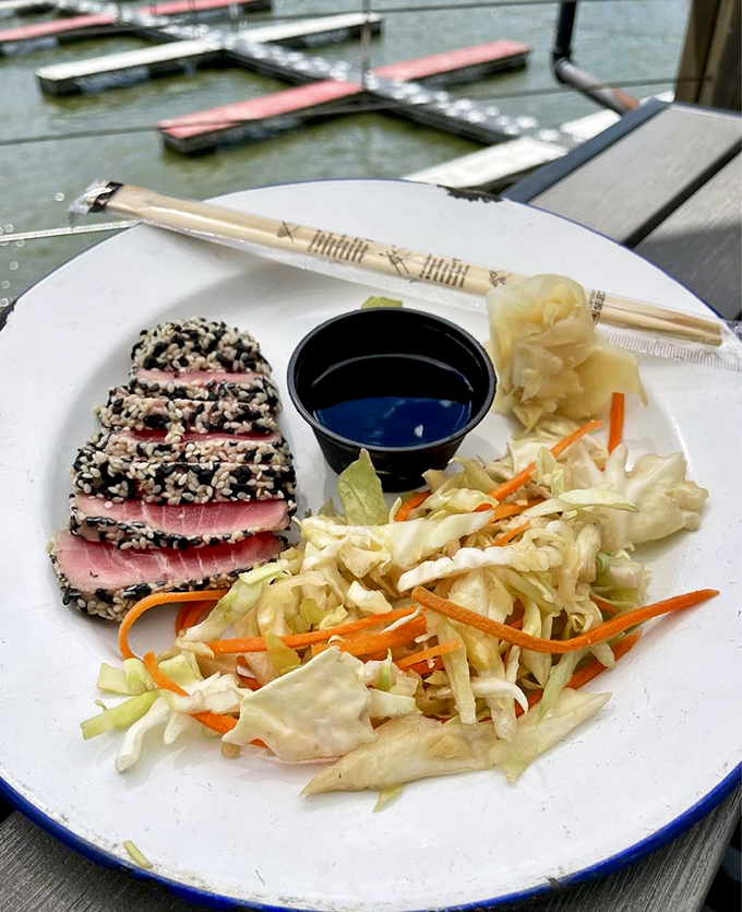Sesame-crusted tuna, seared rare and sliced with precision&mdash;proof that sophisticated seafood can thrive 800 miles from the nearest ocean.