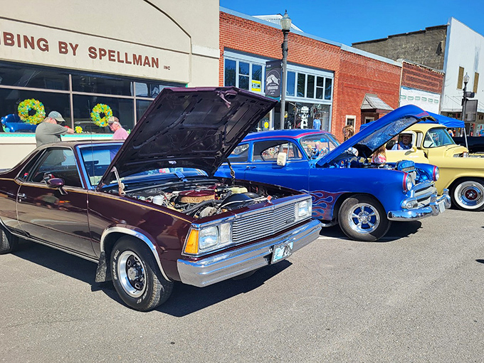 Classic car enthusiasts gather downtown, sharing stories as detailed as their chrome work. These rolling time capsules draw crowds wherever they park.