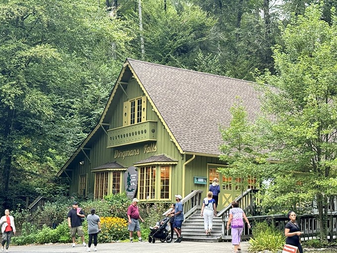The charming visitor center bustles with excited nature lovers preparing for their waterfall adventure.