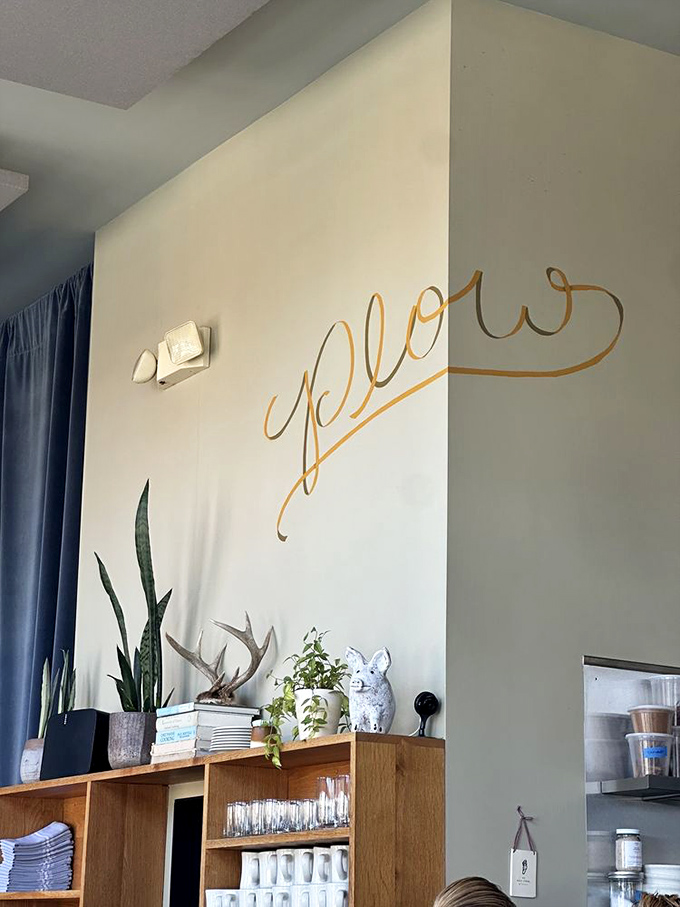 Even the wall decor says "stay awhile"&mdash;elegant gold lettering and thoughtful touches that make you feel instantly at home.