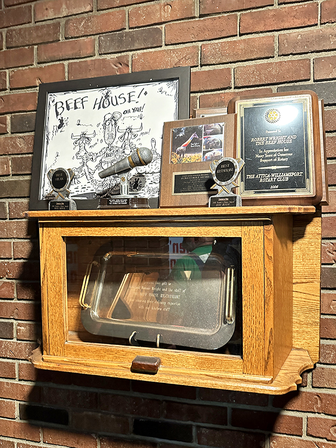 Awards and memorabilia tell the story of decades of dining excellence. Every plaque represents thousands of satisfied customers.