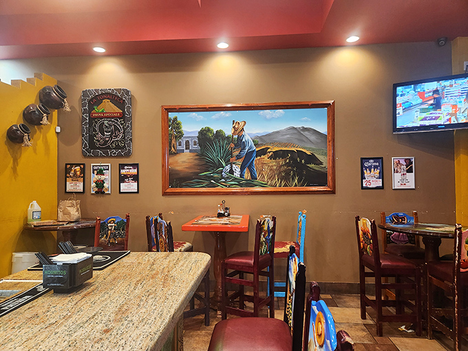 The wall art transports you to the agave fields of Mexico while you contemplate whether one more taco is a decision or a destiny.