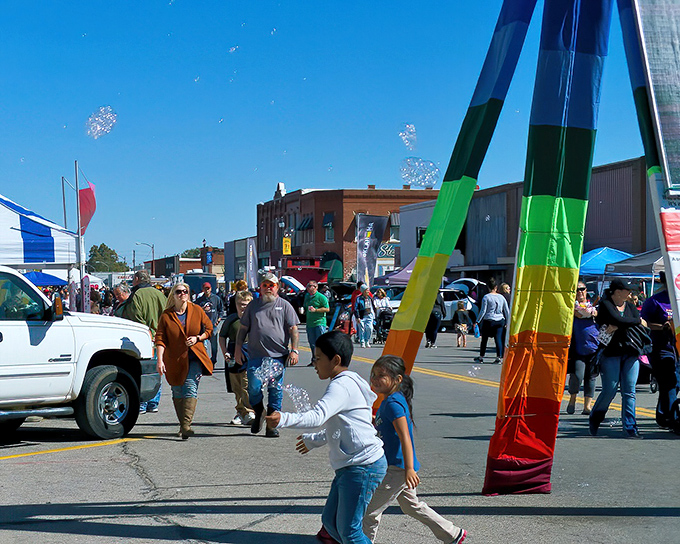 The Watonga Cheese Festival transforms Main Street into a celebration where small-town joy proves more valuable than any stock portfolio.
