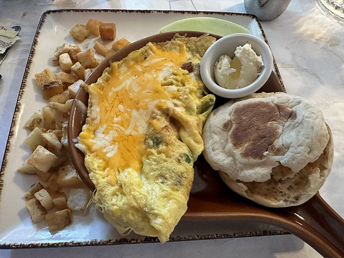 This Western omelet doesn't just whisper "good morning"&mdash;it belts it out with cheese, veggies, and a side of carbs for good measure.