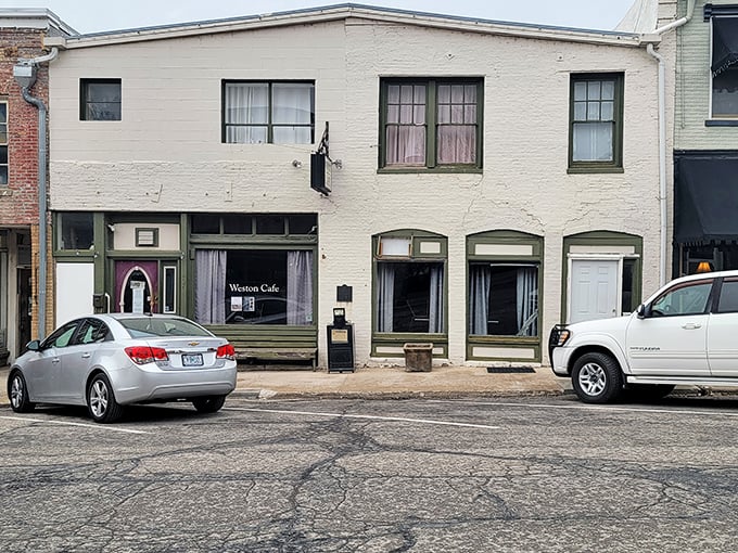 Behind those lace curtains at Weston Cafe, pancakes are flipped with the same care used to preserve the town's historic charm.
