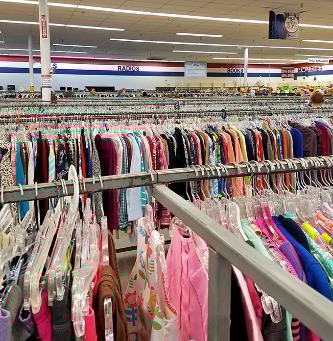 Women's clothing stretches as far as the eye can see, a colorful sea of possibilities organized by size for easy treasure hunting.