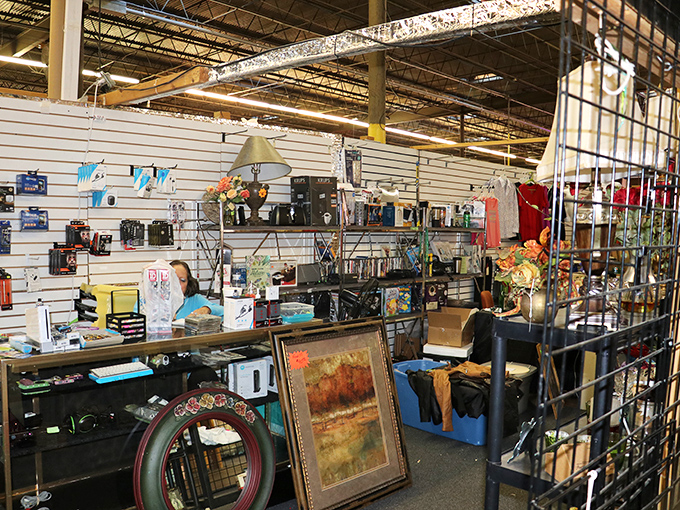 Every surface tells a story in this eclectic booth. That framed artwork might just be the conversation piece your living room has been missing.