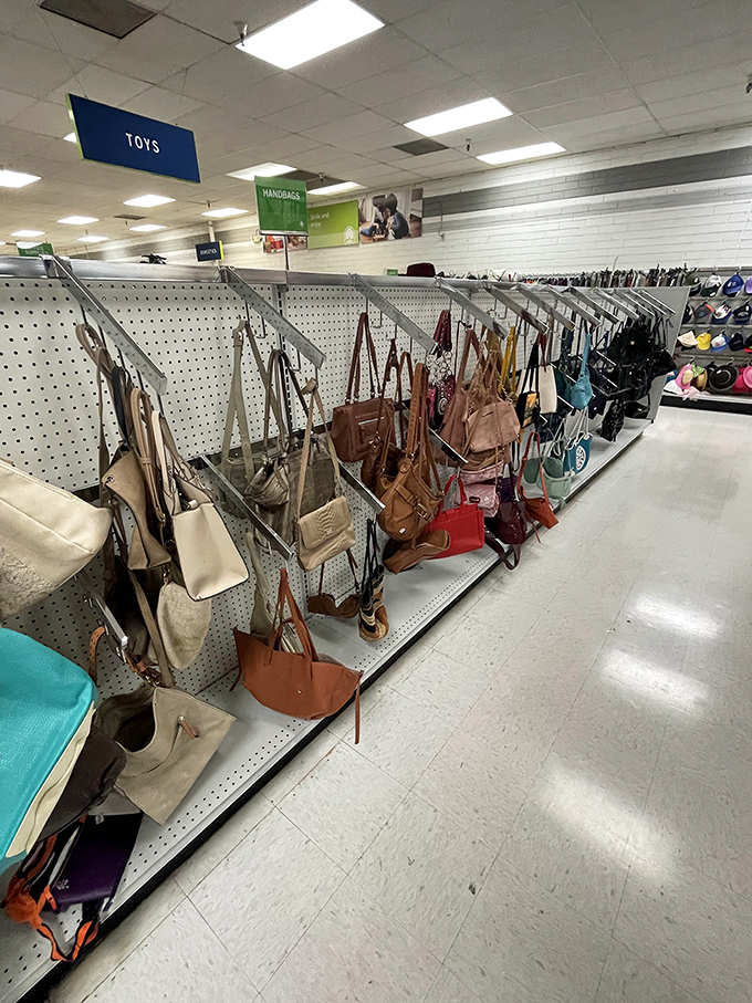 Handbag heaven! From practical totes to statement purses, this display proves one person's "last season" is another's "just what I've been looking for!"