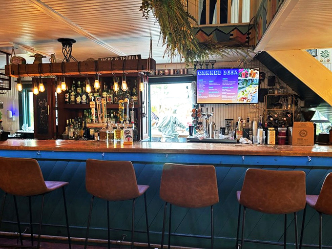 The bar area showcases an impressive selection that transforms this breakfast spot into an all-day destination worth multiple visits.