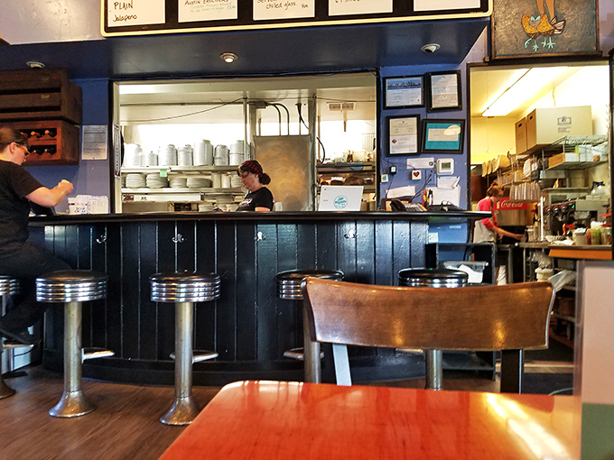 The counter offers front-row seats to the culinary theater, where breakfast is the Broadway show and pancakes are the headlining stars.