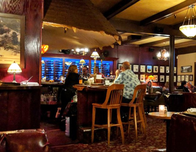 The bar area—where cocktails are crafted with precision, conversations flow freely, and nobody's checking their phone because the present moment is too delicious.