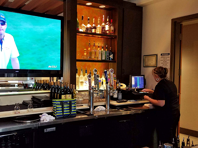 The well-stocked bar promises liquid happiness, whether your preference runs to craft cocktails or a perfectly chilled glass of white.