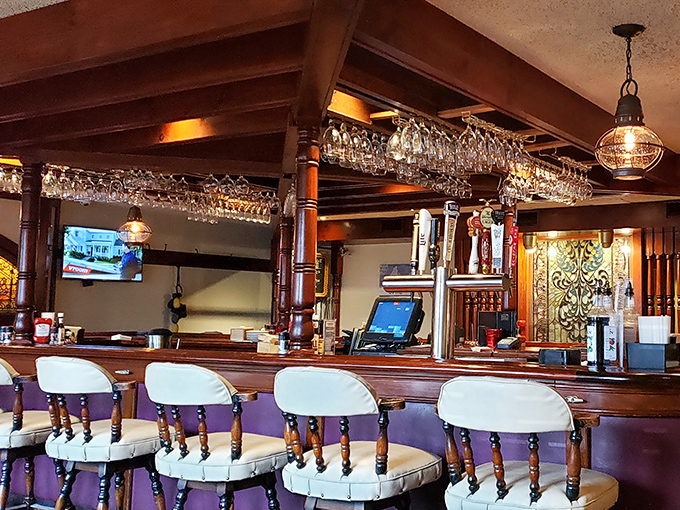 The polished bar area beckons with the promise of perfectly crafted cocktails and good conversation.