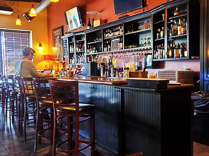 A bar stocked not just with spirits but with the promise of conversation, whether with friends or friendly strangers who become friends over shared food enthusiasm.