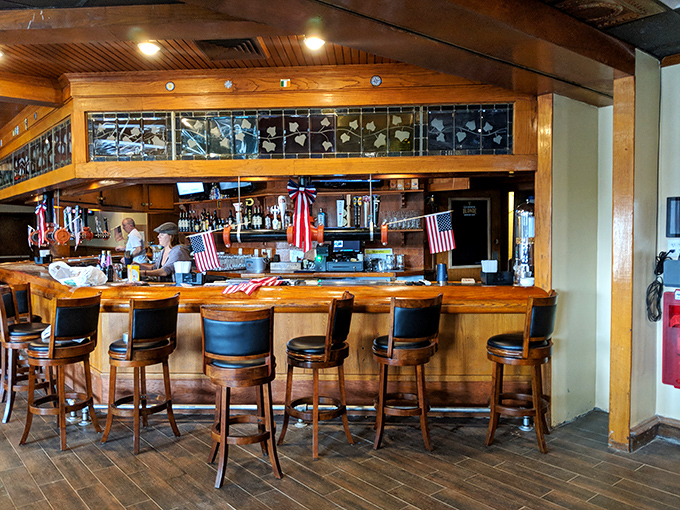 A bar that invites you to pull up a stool and stay awhile, where bartenders pour drinks and stories with equal skill.