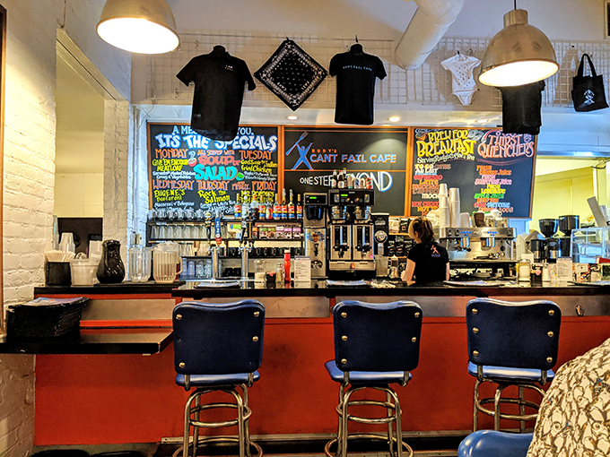 The counter where breakfast dreams come true. Those colorful chalkboard menus promise adventures your taste buds haven't even imagined yet.