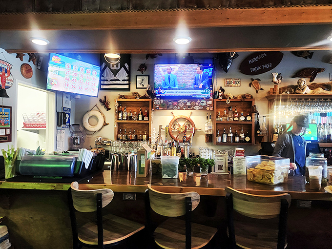 The bar beckons with craft selections that pair beautifully with everything from oysters to tall tales.