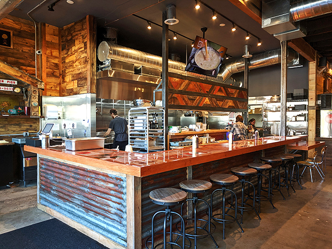 The counter where magic happens. Behind that corrugated metal and wood is a team turning humble poultry into the stuff of legend.