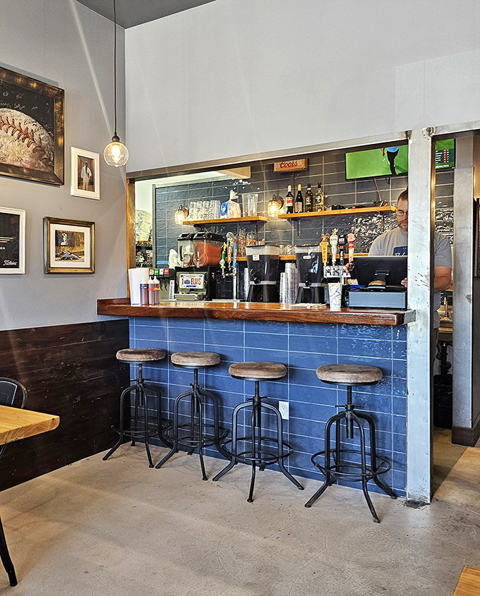 The blue-tiled bar counter where locals gather to debate the finer points of barbecue technique and life.