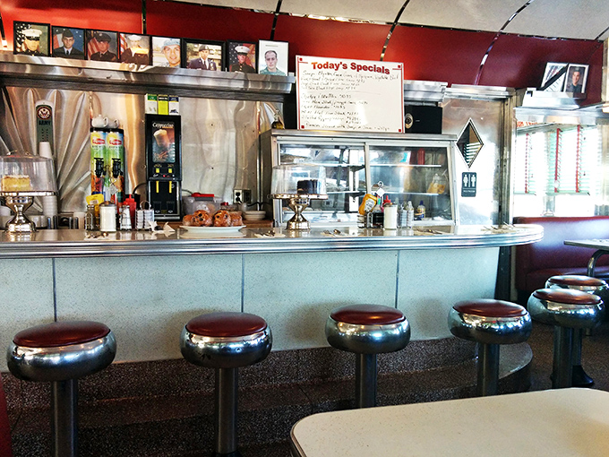 The counter seats&mdash;where solo diners become regulars, and regulars become family. Each chrome stool has heard a thousand stories.