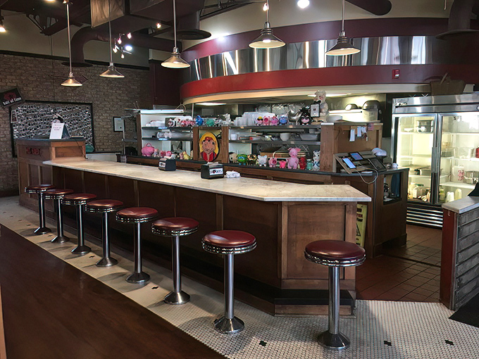 The counter seating isn't just practical—it's prime real estate for barbecue theater, where you can watch your smoky dreams materialize before your eyes.