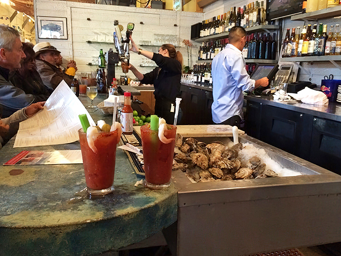 The bar area doubles as an impromptu oyster station, where Bloody Marys stand at attention next to their shellfish companions like loyal bodyguards.