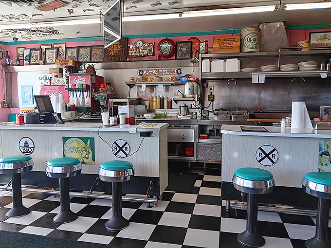 The counter seats aren't just the best spots in the house—they're front-row tickets to the choreographed ballet of short-order cooking.