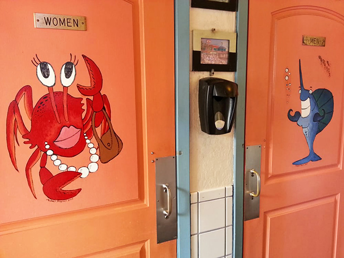 Even the bathroom doors have personality &ndash; these cartoon sea creatures dressed in their Sunday best are ready for your visit.