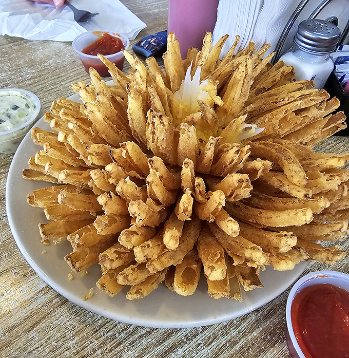 The Bloomin' Onion's sophisticated cousin has arrived&mdash;a golden sunburst of crispy onion rings that demands to be shared but deserves to be hoarded.