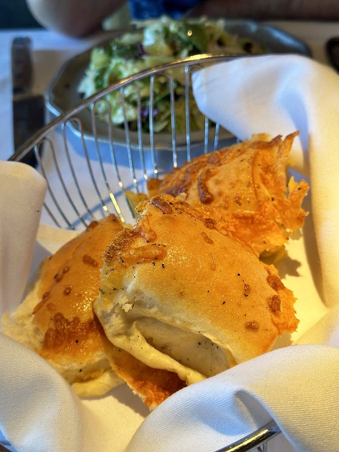 Golden, crispy cheese bread that makes you question your lifelong commitment to saving room for the main course.