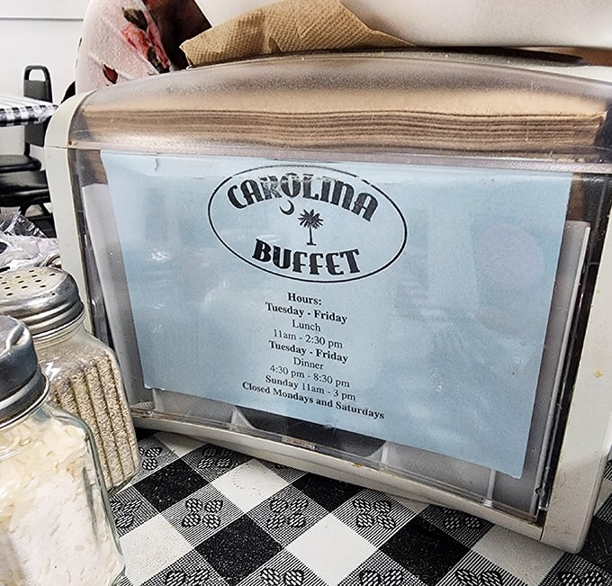 The hours posted like a promise &ndash; Tuesday through Friday, the buffet awaits. Plan your week accordingly, your stomach will thank you.