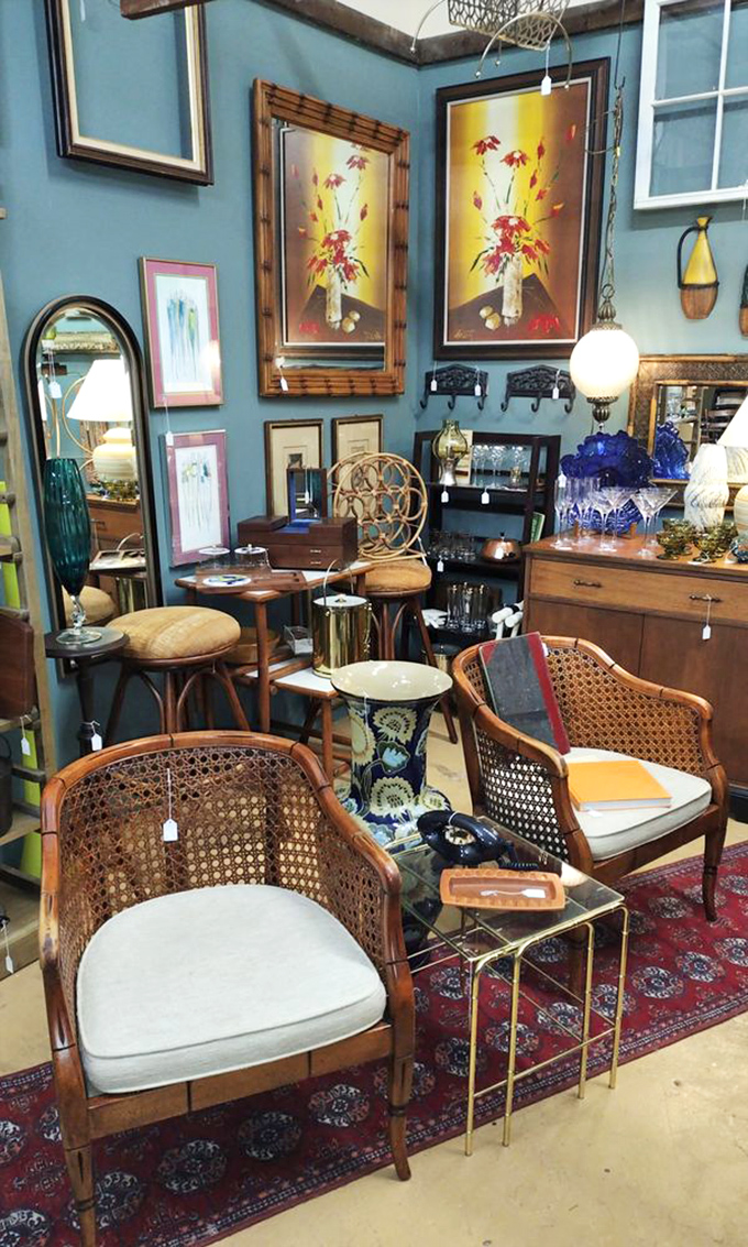 Cane-backed chairs that whisper "sit awhile" surrounded by blue walls that practically demand you bring home something special.