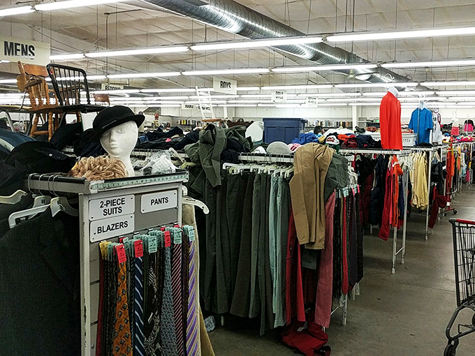 The men's department, complete with mannequin sentinel standing guard over an impressive collection of ties that span several decades of fashion.