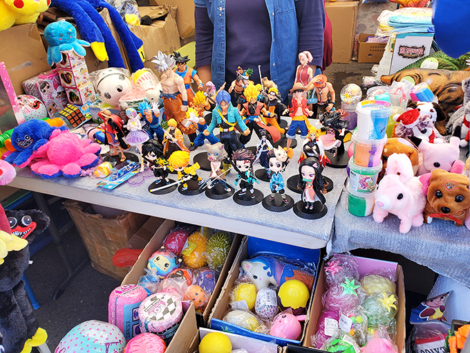 Collector's corner chaos in the best possible way. From anime figurines to nostalgic toys, this table is where childhood joy meets adult collecting passion.