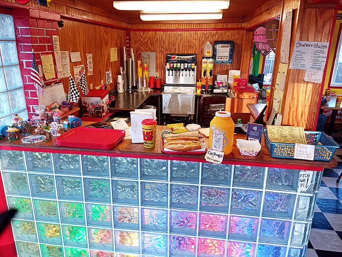 Behind this colorful counter, culinary magic happens with the efficiency of a NASCAR pit crew and twice the flavor.