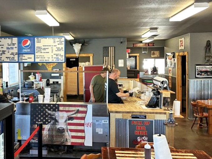 American flags and meat-cutting stations—the barbecue equivalent of a theater's backstage. Where the magic happens before it hits your plate.