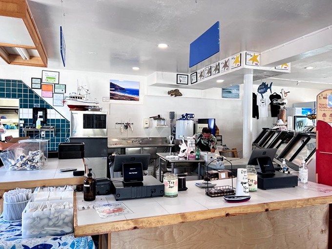 The counter where magic happens&mdash;where orders are called, fresh catches are displayed, and the staff moves with the choreographed precision of seafood ballet.