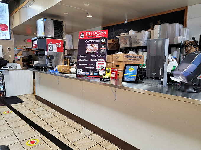 Where sandwich magic happens. The counter area hums with efficiency, like a well-choreographed dance of meat and cheese.