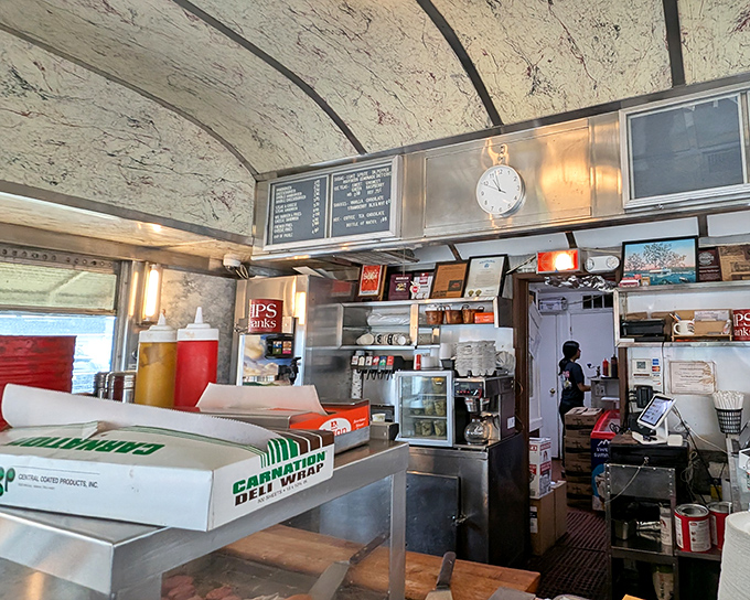 The curved counter creates a community of strangers united by one noble purpose: the pursuit of slider happiness.