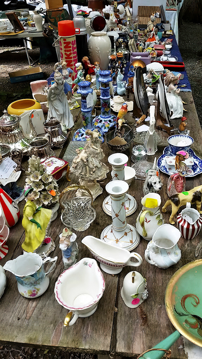 Porcelain personalities standing at attention. This tabletop gathering of figurines and teacups is waiting for their invitation to your china cabinet.