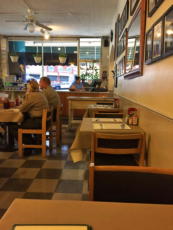 The checkered floor and wooden tables have witnessed decades of first dates, family gatherings, and solo newspaper readers enjoying perfect eggs.