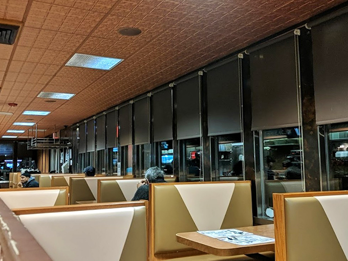 Classic booths line up like old friends waiting for conversation&mdash;their cream vinyl seats having heard decades of first dates, family meals, and late-night confessions.