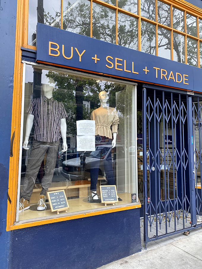 The storefront proudly announces its sustainable fashion mission: BUY + SELL + TRADE. Fashion recycling at its most stylish.