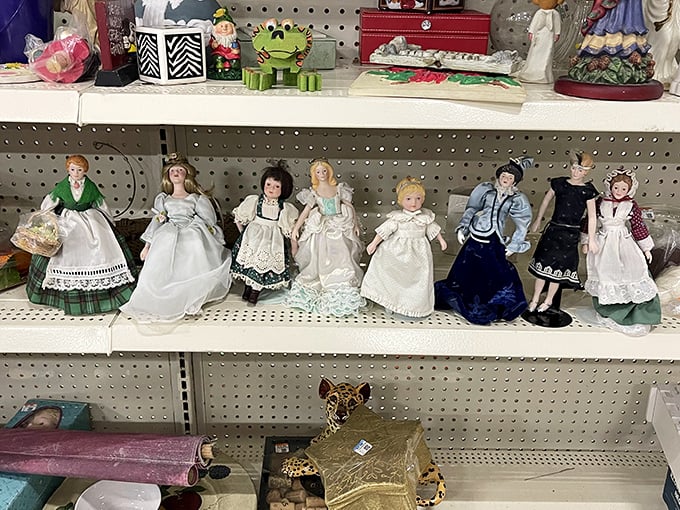 Porcelain dolls gaze with timeless expressions, collectibles that once graced curio cabinets now seeking new homes with appreciative admirers.